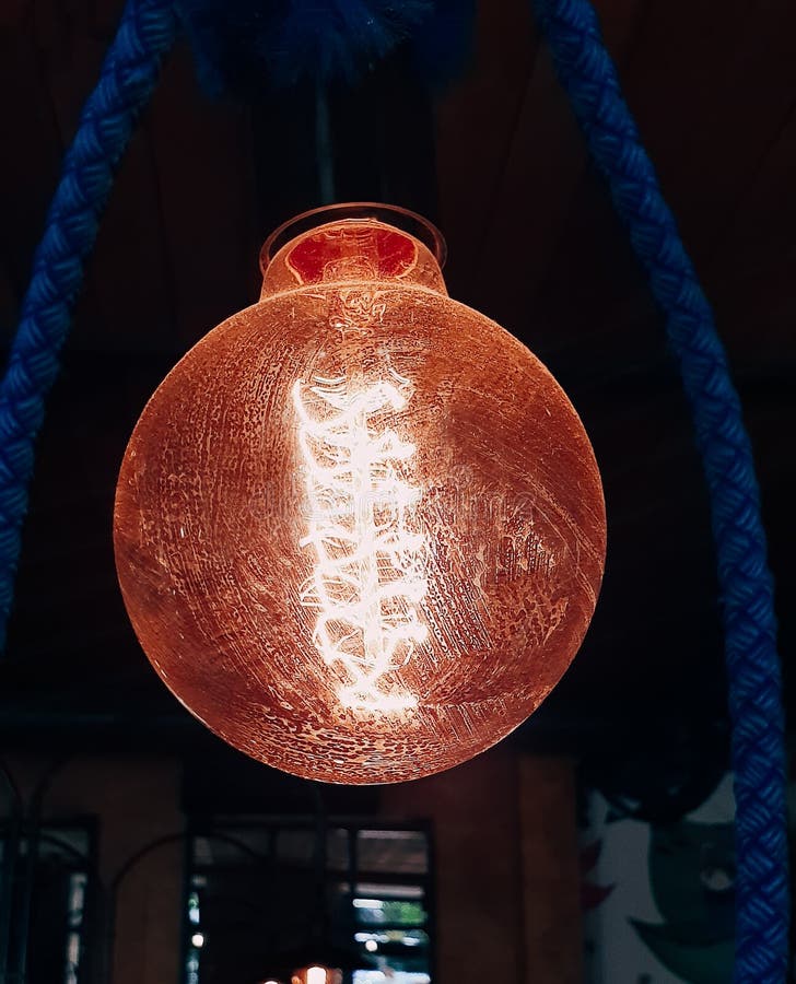 Light bulb Edison close-up editorial stock photo. Image of glowing ...