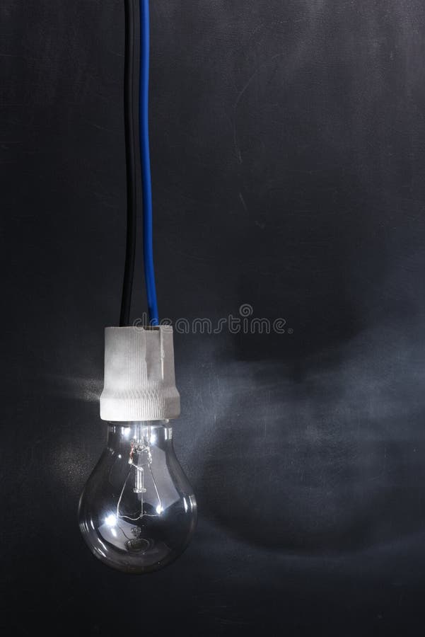 Light Bulb on Electric Cable Stock Photo - Image of lightbulb, material ...