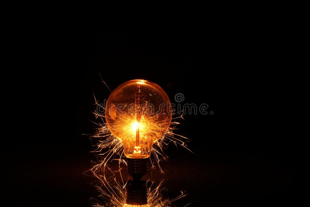 Light Bulb Exploding Emitting Sparks Stock Photo - Image of black ...
