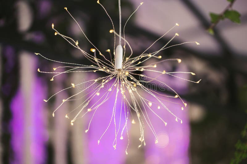 A Light Bulb in the Form of a Sparkler As a Restaurant Decor Stock ...
