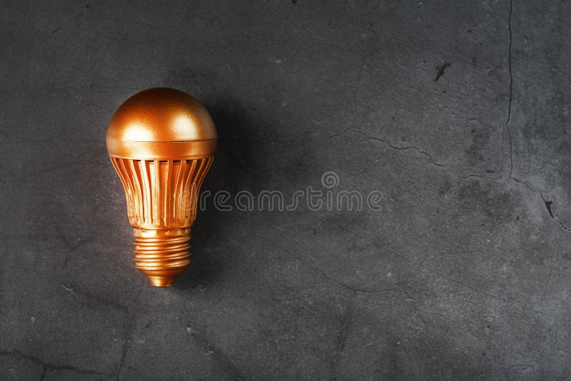 Light Bulb from Gold on Black Stone Concept of a Profitable Idea. Stock ...