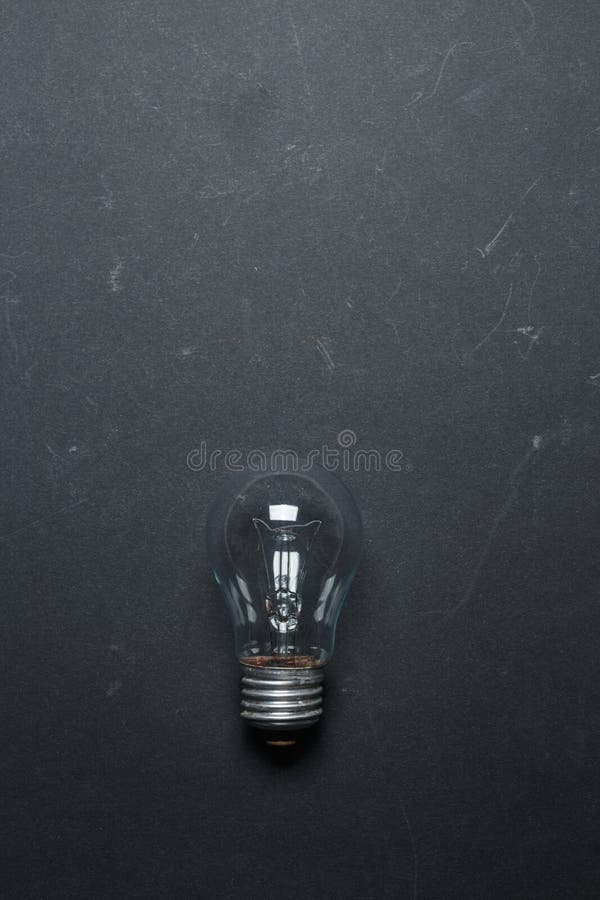 Light Bulb on Gray Background, Top View. Creative Idea Concept Stock ...
