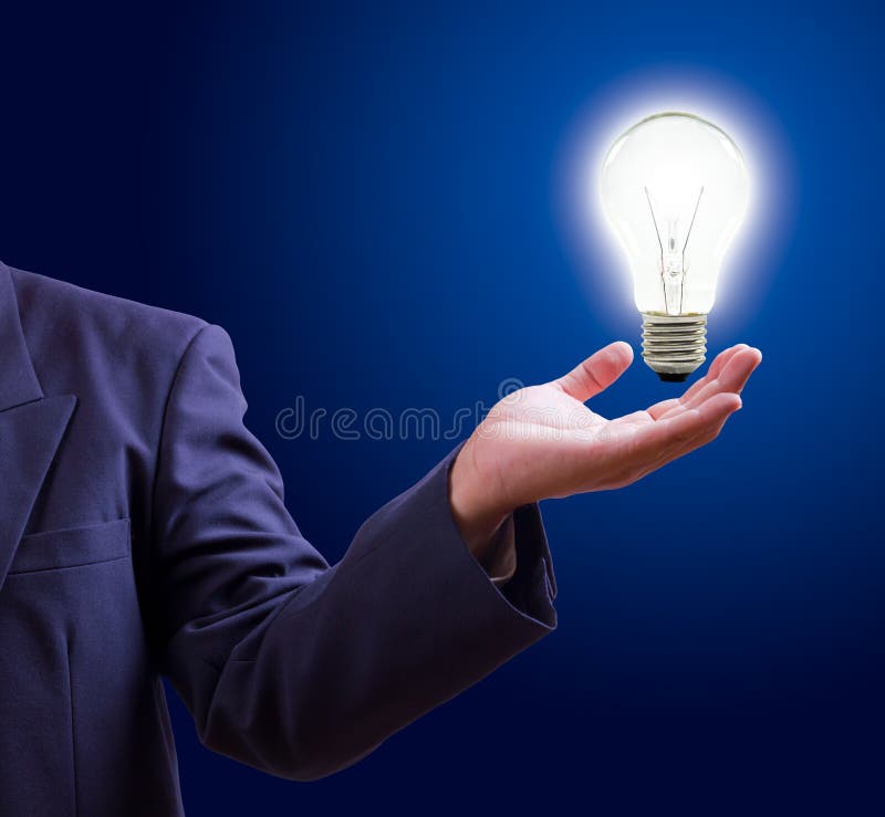 Light bulb on hand stock photo. Image of light, power - 21979674