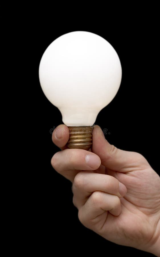 A light bulb in a hand stock image. Image of good, hold - 636393