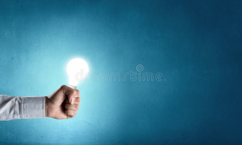 Light bulb in hand stock image. Image of technology, think - 59993537