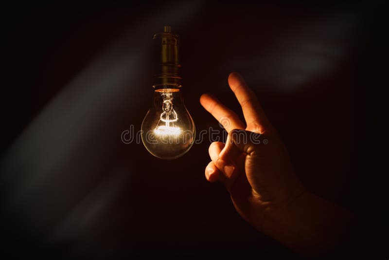 Light bulb and hand stock image. Image of intelligence - 85996347
