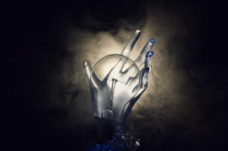 Light bulb in hand in fog. stock photo. Image of business - 90651014