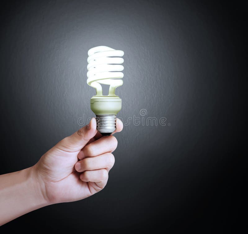 Light bulb in a hand stock illustration. Illustration of shine - 32283421
