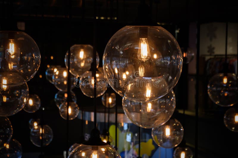 Retro Light Bulb Hanging on Ceiling. Interior Lighting in the Dark ...