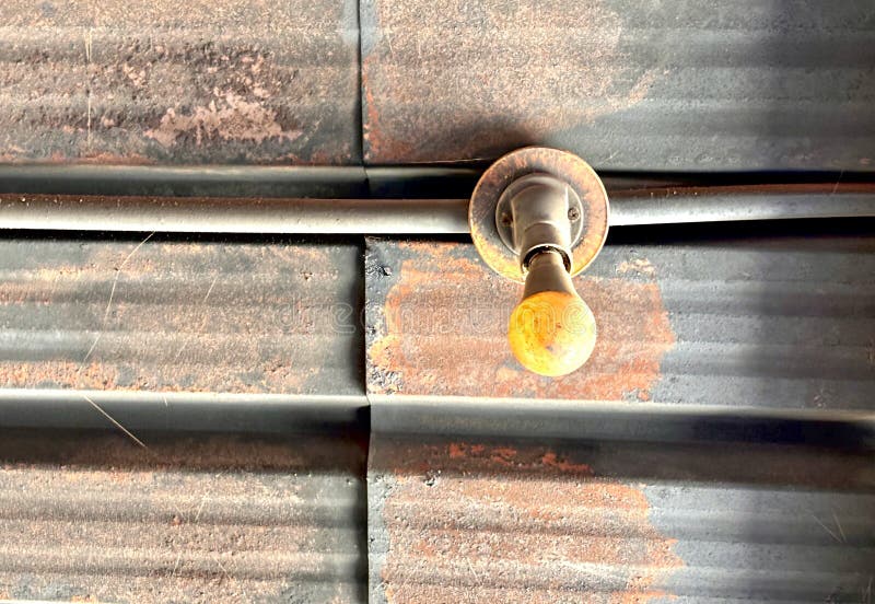 A Light Bulb is Hanging from a Ceiling Stock Image - Image of home ...