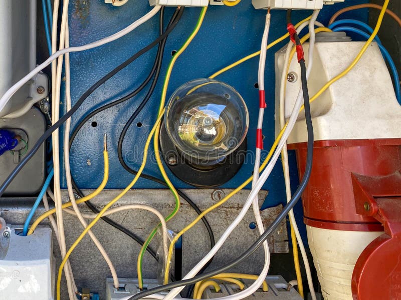 A Light Bulb in a Homemade Electric Control Cabinet for Electronic ...