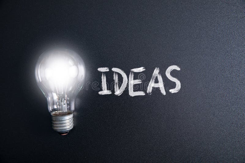 Light Bulb with Ideas Text on Board Stock Image - Image of solution ...