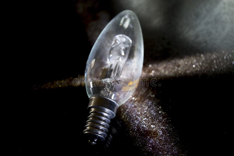 Light Bulb Illuminated with Stripes of Light Stock Photo - Image of ...
