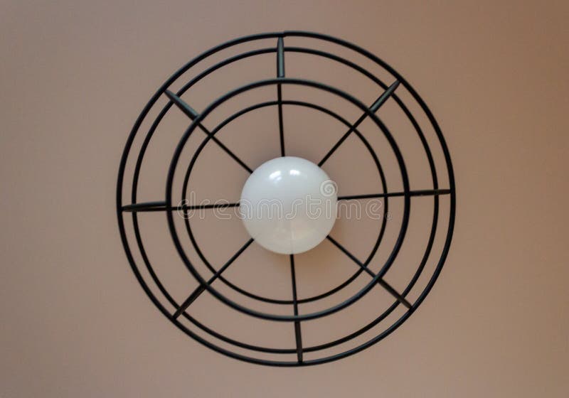 Light bulb in iron circles stock image. Image of decor - 123259431