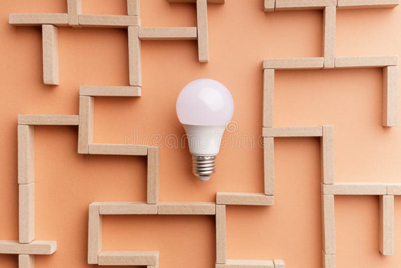 Light Bulb Led in a Maze of Blocks Stock Image - Image of power ...