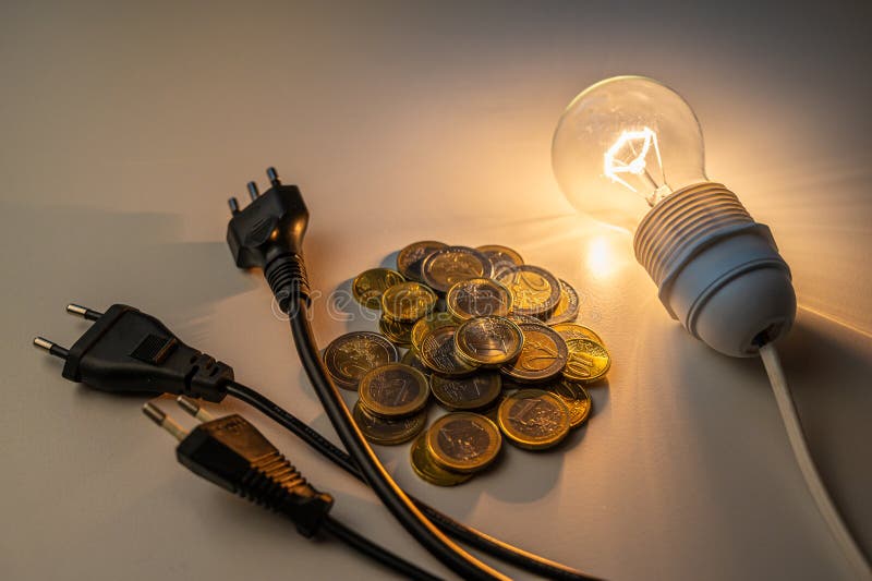 Light Bulb on, with Electrical Plugs, Banknotes and Coins. Energy ...