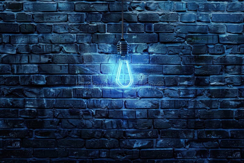 Light Bulb is Lit Up Against a Brick Wall Stock Photo - Image of ...