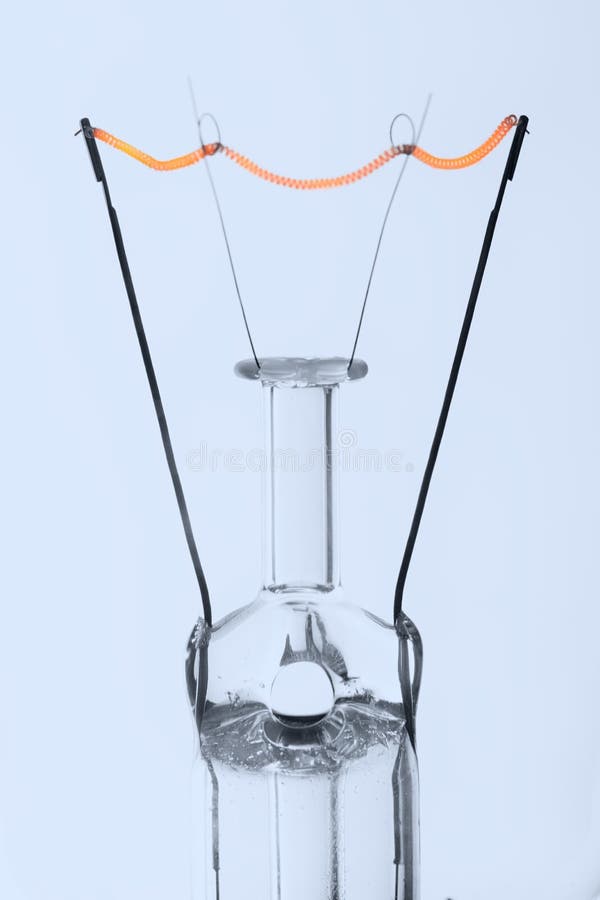 Light Bulb Macro with the Filament Wire and Construction Artistic ...