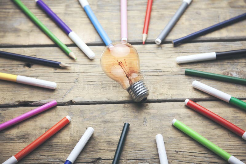 Light Bulb with Many Pencils and Markers Stock Photo - Image of ...