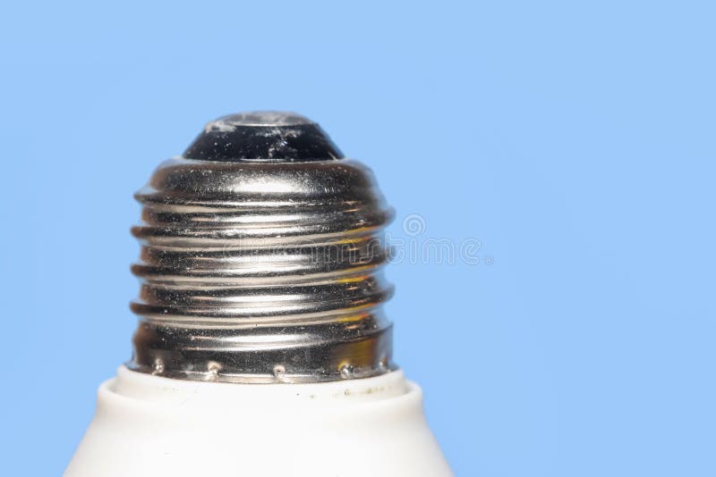 Light Bulb Mounting Against Blue Background Stock Photo - Image of ...