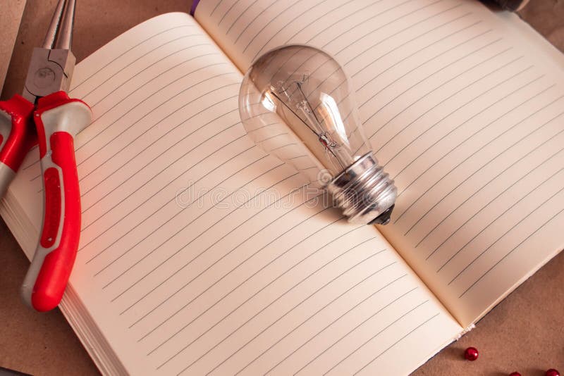 Light Bulb on Notepad, Idea, Creativity Stock Photo - Image of business ...