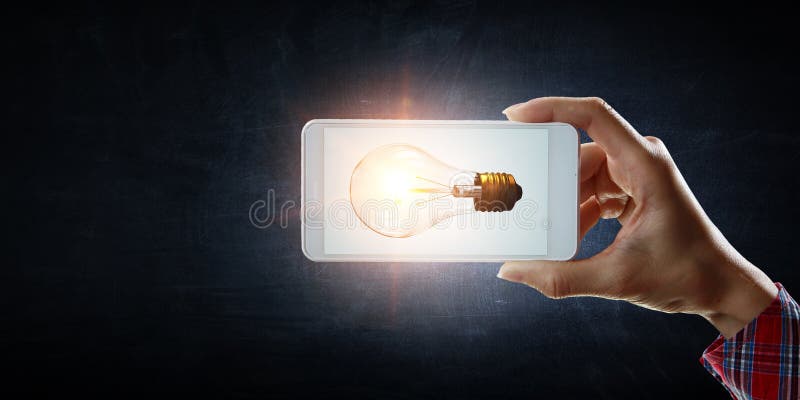 Light Bulb on Phone Screen . Mixed Media Stock Image - Image of lamp ...