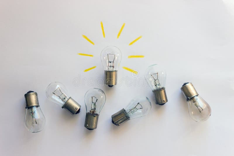 Light Bulb with Rays on a White Background. Concept- Idea, Inn Stock ...