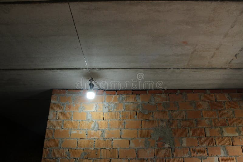 A Light Bulb in the Room. Dim Lighting and Crime Stock Image - Image of ...