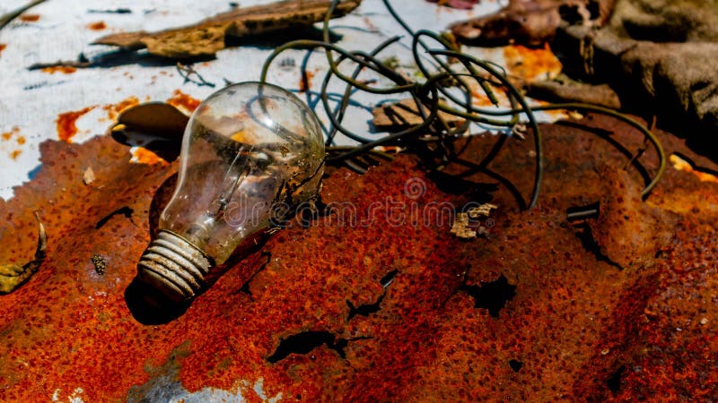 Light Bulb on Rusty Zinc As a Background Stock Photo - Image of ...