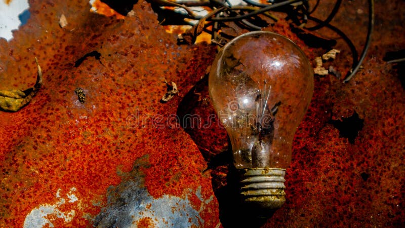 Light Bulb on Rusty Zinc As a Background Stock Image - Image of ...