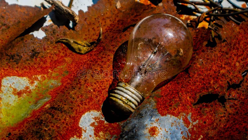 Light Bulb on Rusty Zinc As a Background Stock Image - Image of bright ...
