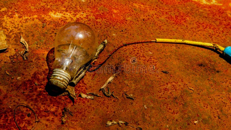 Light Bulb on Rusty Zinc As a Background Stock Photo - Image of ...