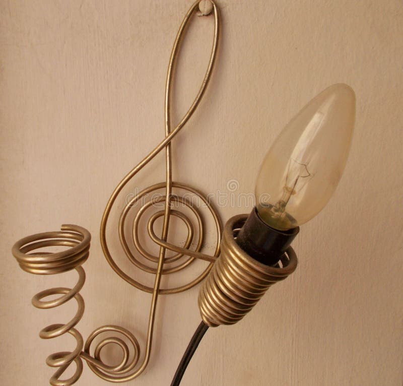 Light Bulb`s Wires in Shape of Music Key. Stock Photo - Image of roll ...