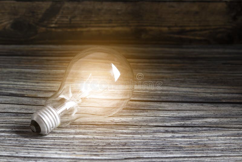 A Light Bulb Shining Brightly Placed Stock Photo - Image of intelligent ...