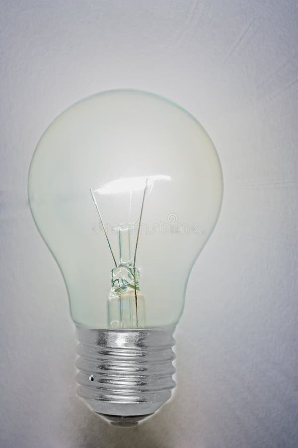 Light Bulb Shining With Reflection Stock Photo - Image of globe, opal ...