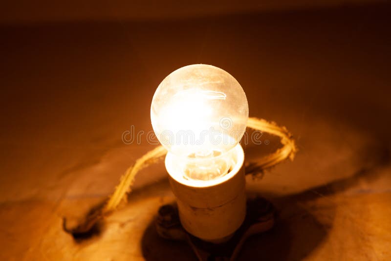 Light Bulb in the Socket To Glow Stock Photo - Image of light ...