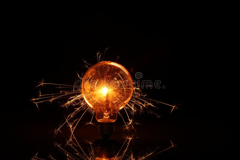 Light Bulb Exploding Emitting Sparks Stock Photo - Image of close ...