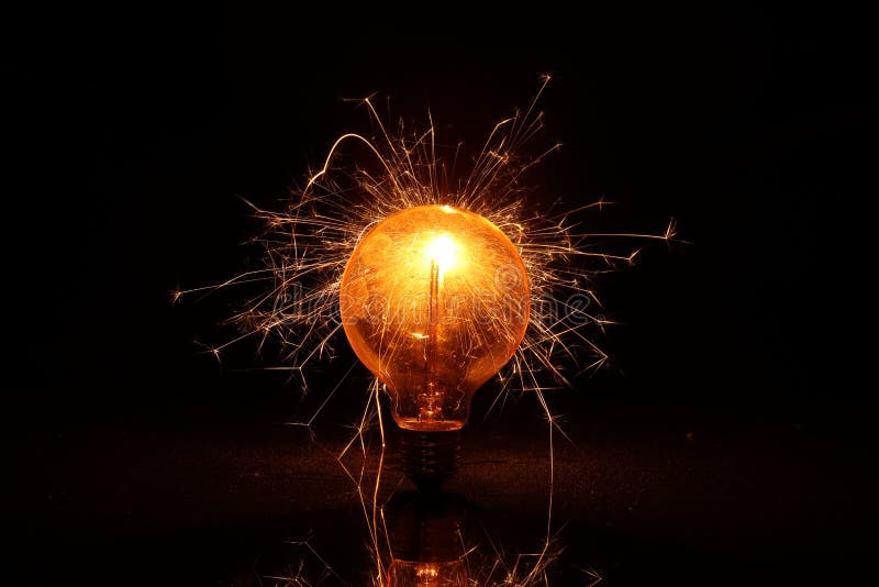 Light Bulb Exploding Emitting Sparks Stock Photo - Image of design ...