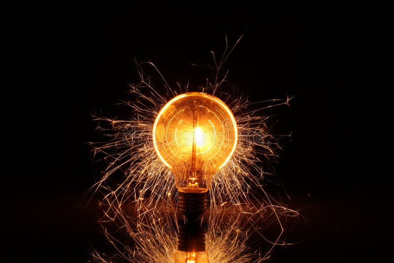 Light Bulb Exploding Emitting Sparks Stock Image - Image of decorative ...