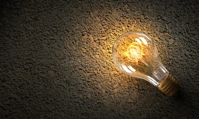 Light Bulb on Stone Surface Stock Image - Image of filament ...