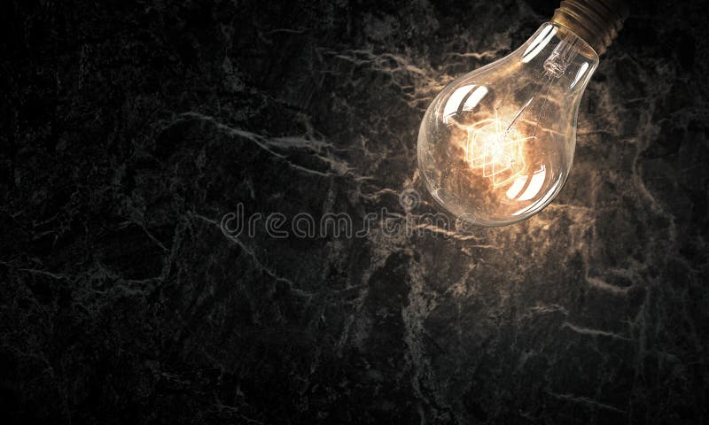 Light Bulb on Stone Surface Stock Photo - Image of bright, decoration ...