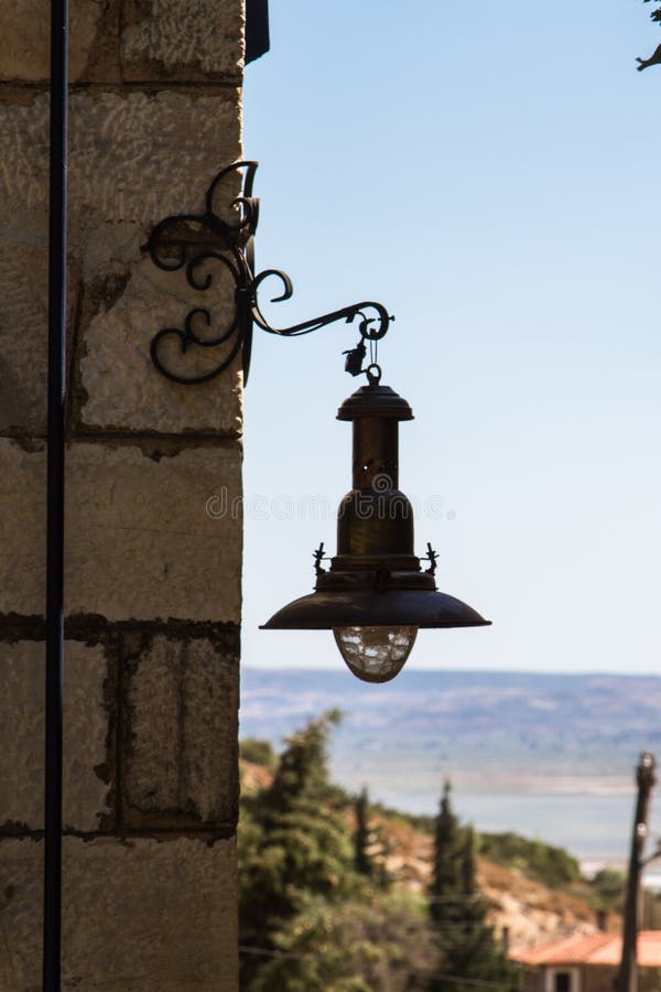 Light Bulb on Stone Wall stock image. Image of stone - 34032181