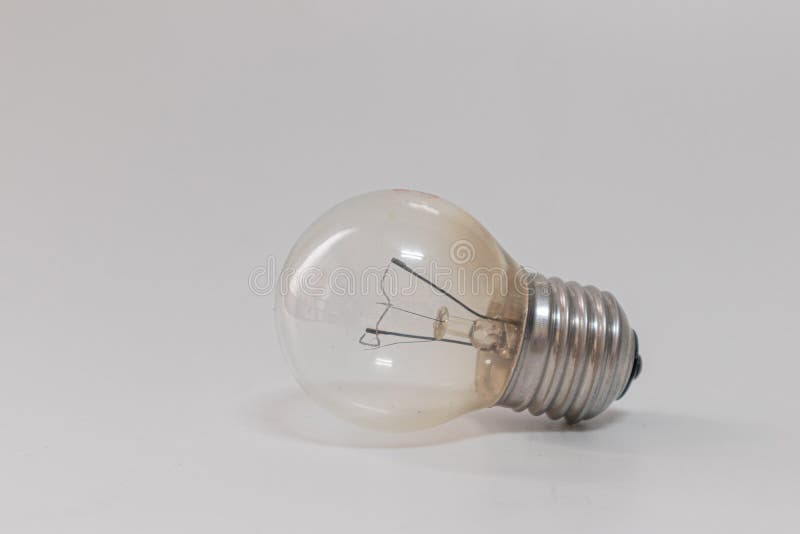 Light Bulb Turned Off, Horizontally, Isolated on a Plain White ...