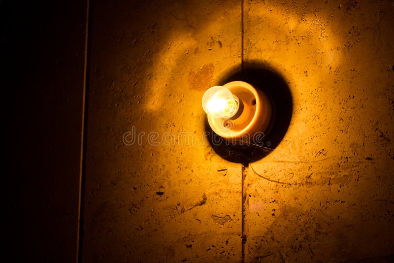 Light bulb on wall stock image. Image of antique, night - 22947723