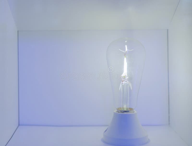 Light bulb on the wall stock image. Image of energy - 327913367