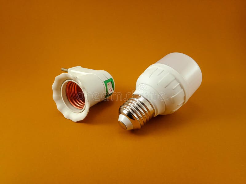 Light Bulb with a White Plug Adapter Stock Image - Image of gold ...