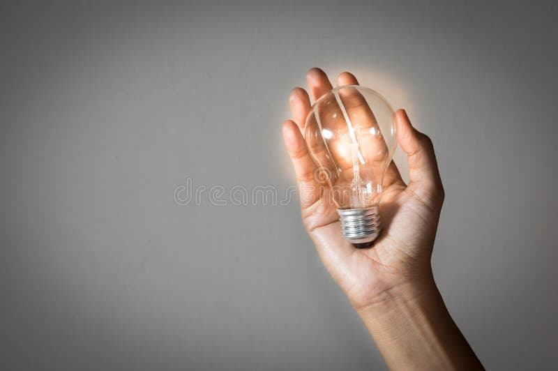Light Bulb in Hand,concept Idea. Stock Photo - Image of idea, glowing ...
