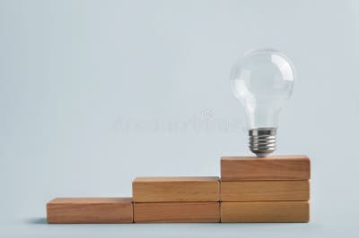 Light Bulb on Wooden Stairs. Problem Solving Skill, Creativity ...