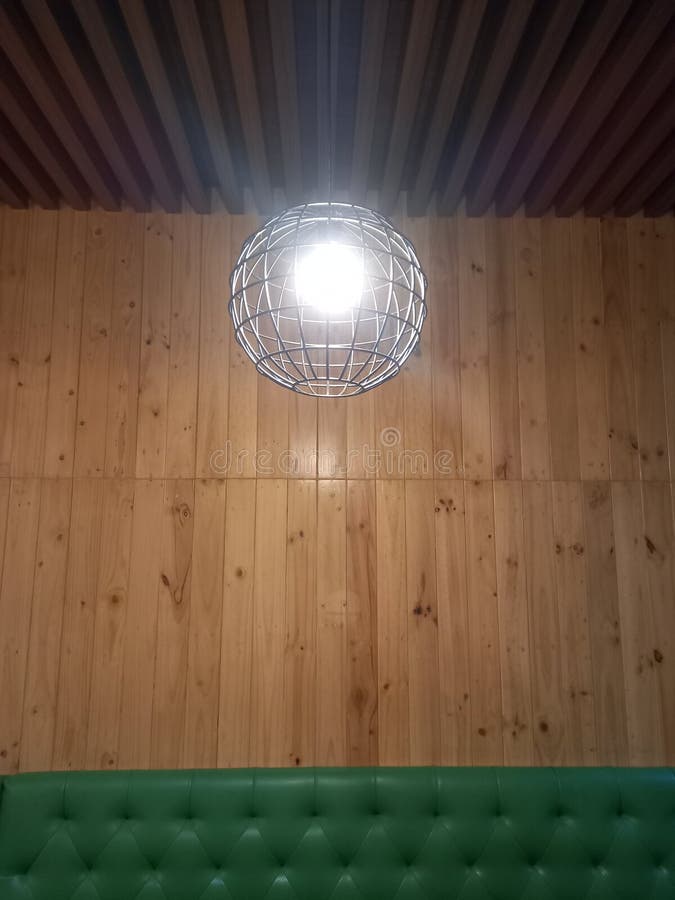 Light Bulb Wrapped in Iron Basket Stock Photo - Image of light, bulb ...