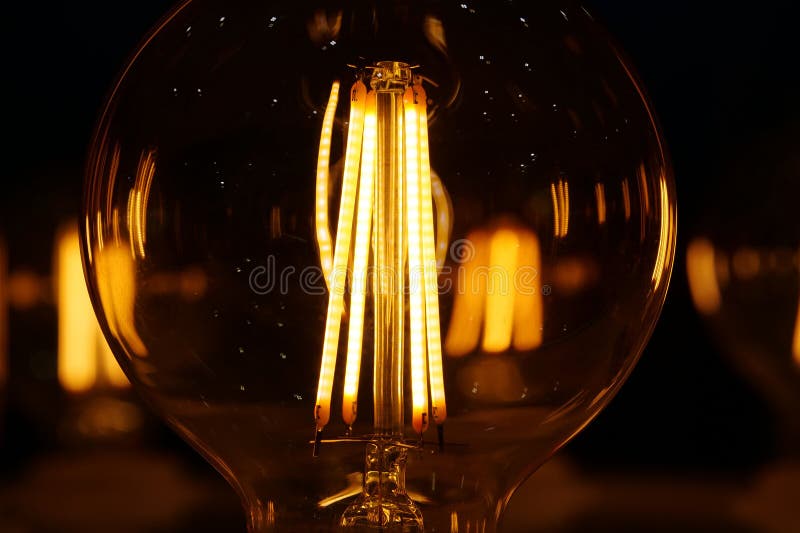 Light Bulbs with Big Yellow Filaments Inside in Vintage Style Stock ...